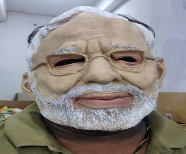 Holi 2021: होली पर बाजार में छाया 'मोदी मुखौटा', बच्‍चों के बीच सबसे ज् ...