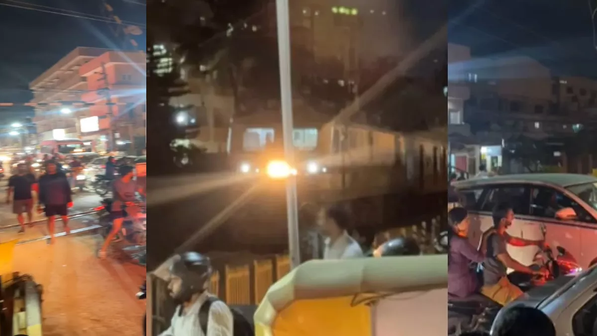 Vidoe: ट्रैफिक में फंसी ट्रेन, लोको पायलट करता रहा फाटक खाली होने का ...