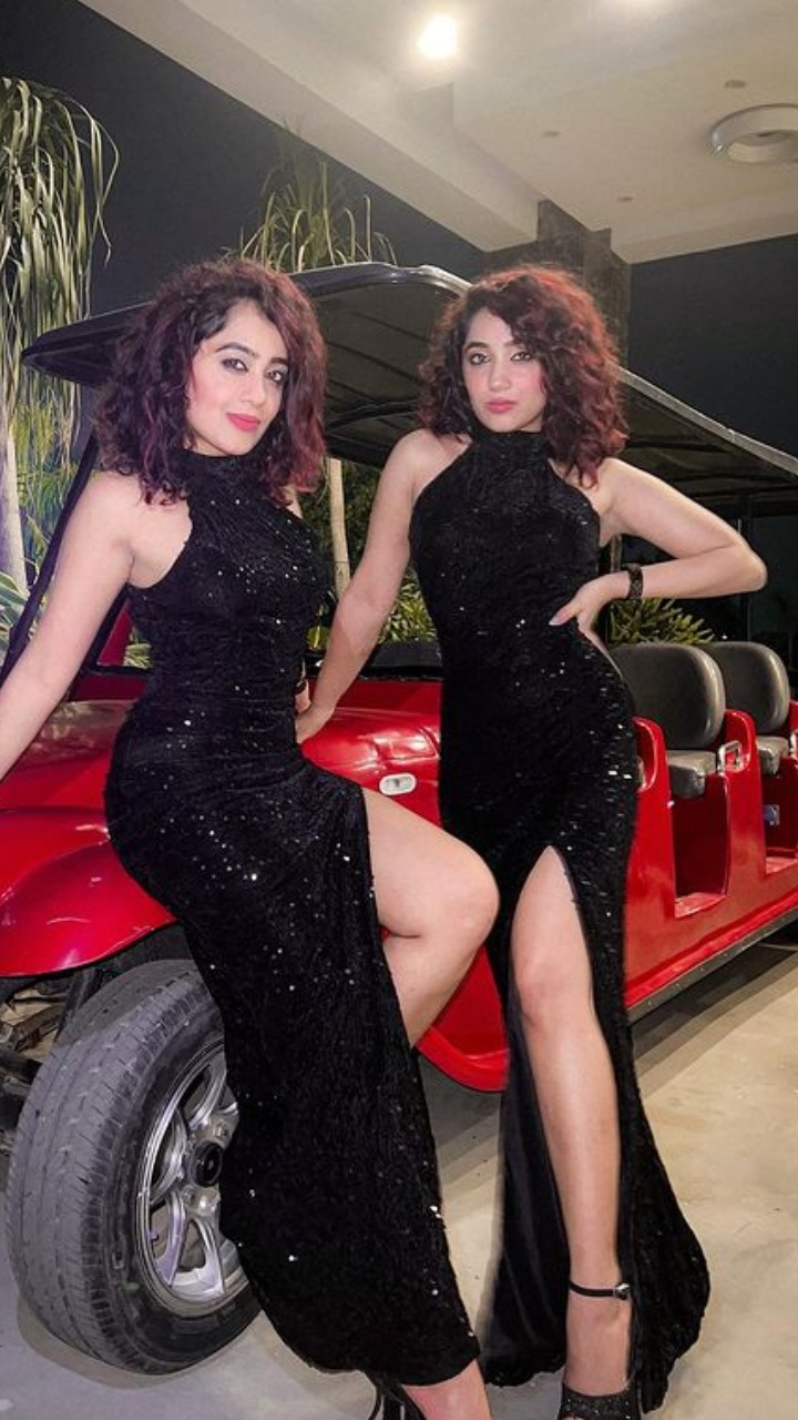 Chinki Minki raises the temperature in black high slit dress see here